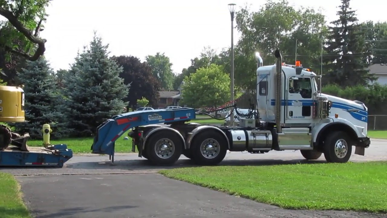 Excavator on Float Truck - YouTube