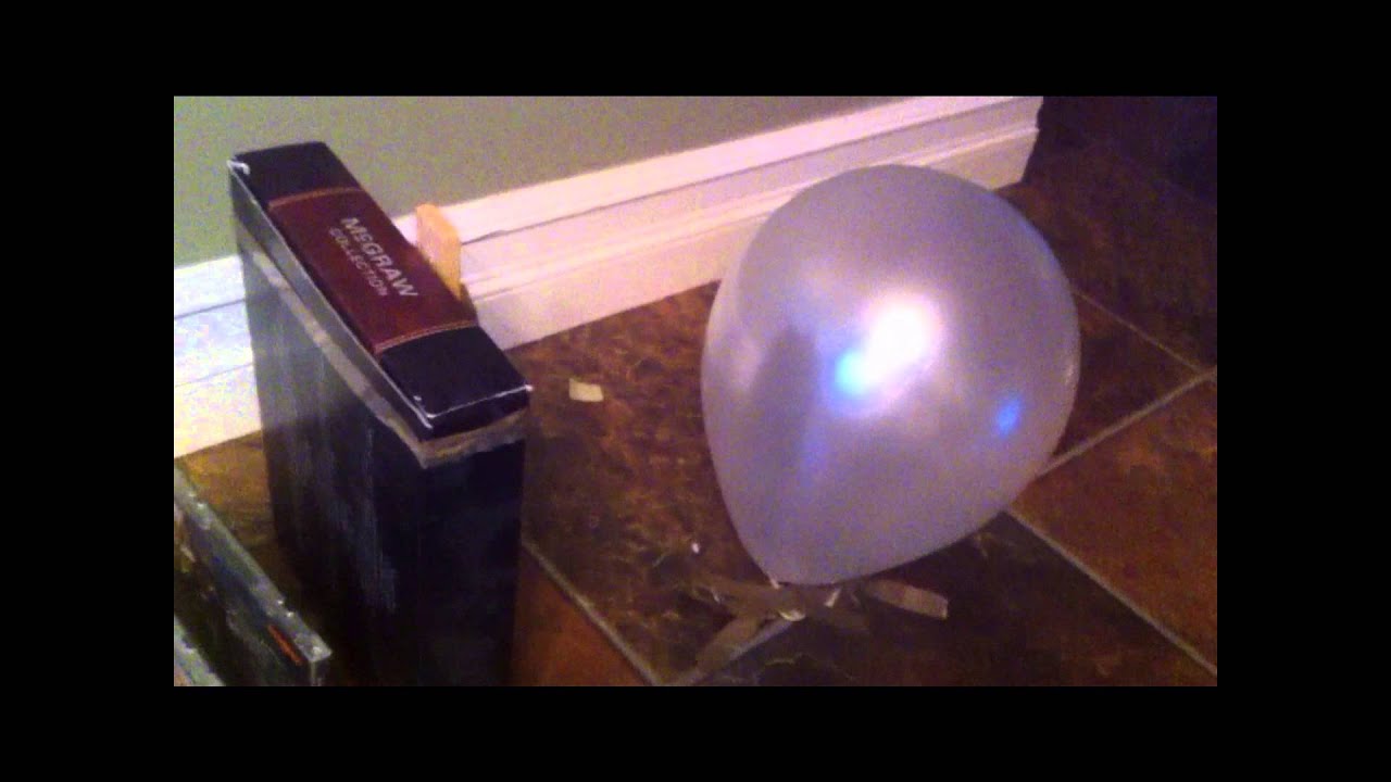 My simple Rube Goldberg how to pop a balloon machine - YouTube