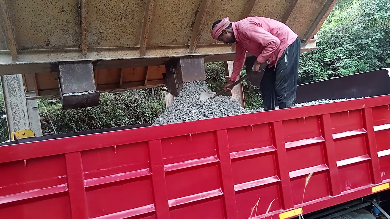 crusher stone loading in tipper - YouTube