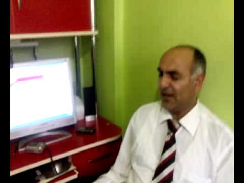 Süleyman Turan-Kapının Önünde Önlük Dikiyi