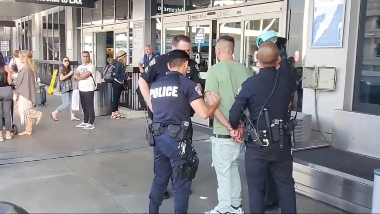 Lax airport police on a 390 man - YouTube
