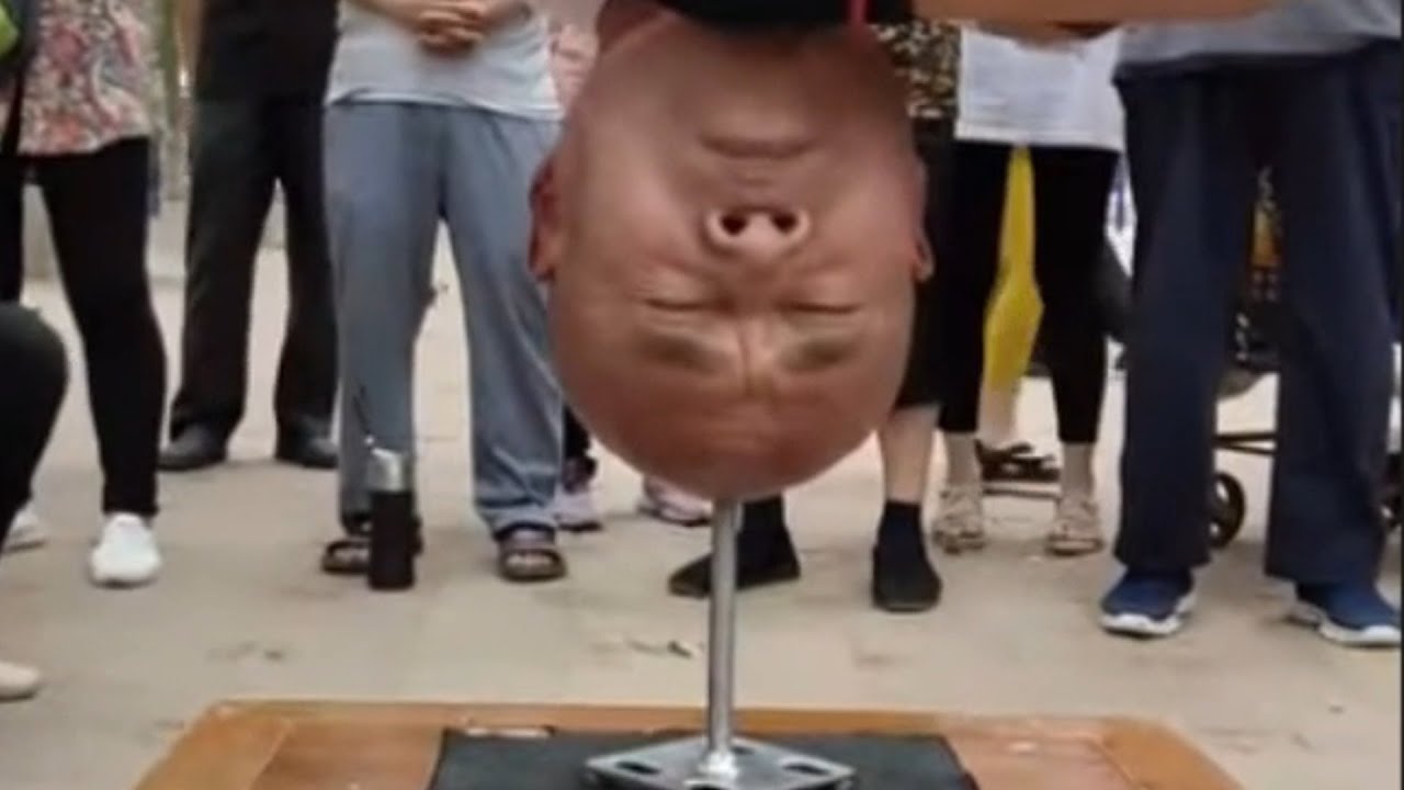 Balancing Head on a Metal Rod (World Record) - YouTube