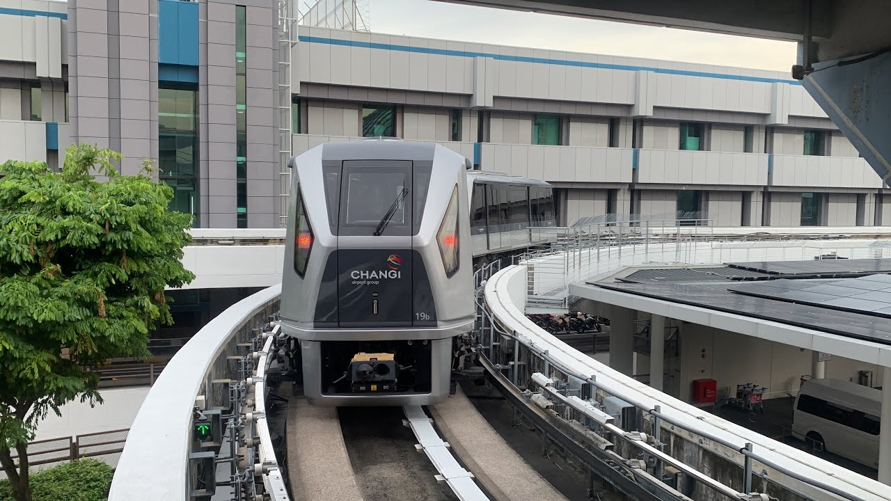 Changi Airport Skytrain Mitsubishi Crystal Mover [02/19] departing ...