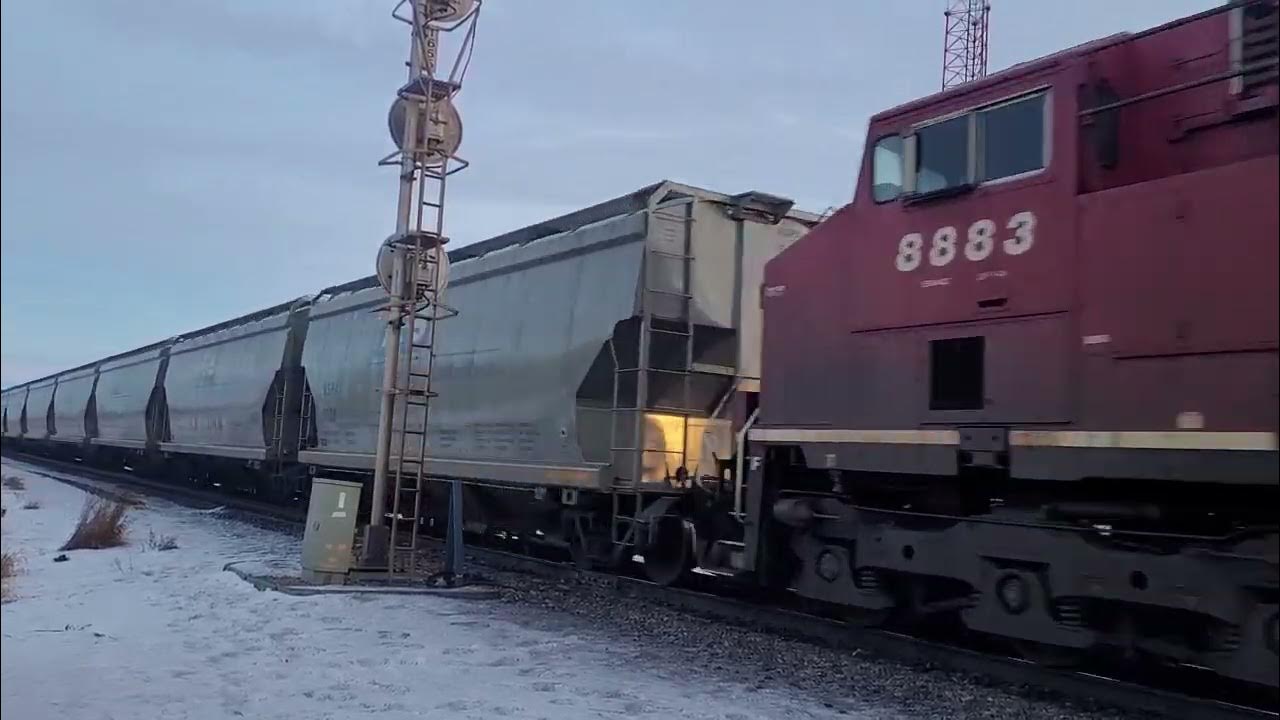 K&S potash loads with friendly crew come highballing west bound through Shepard Ab - YouTube