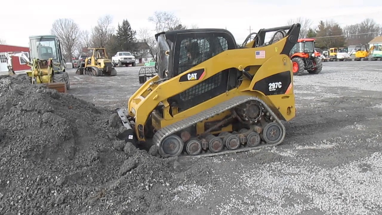 Caterpillar 297C - YouTube