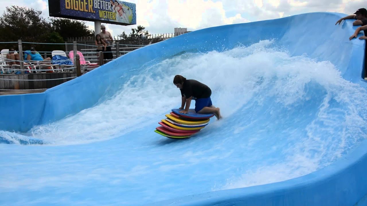 8 Boards on the Flowrider Curl at Hurricane Harbor trick - YouTube