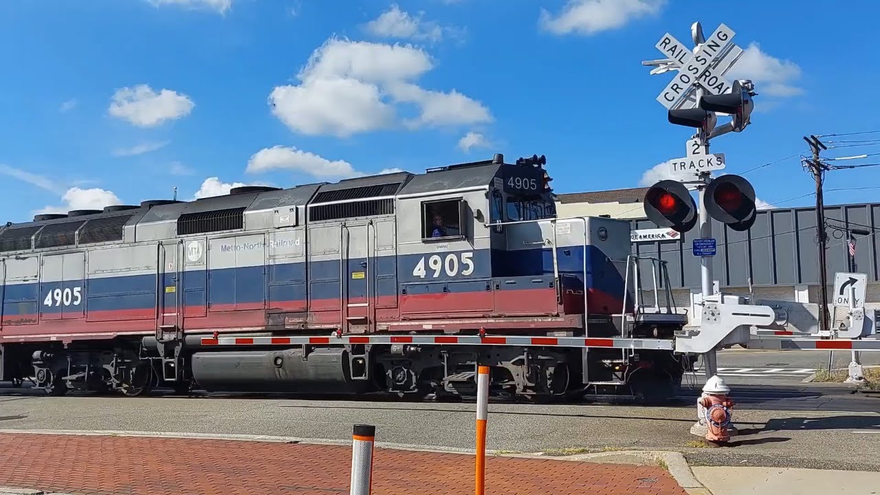 Metro North GP40FH 2 pulls train across Park Ave - YouTube