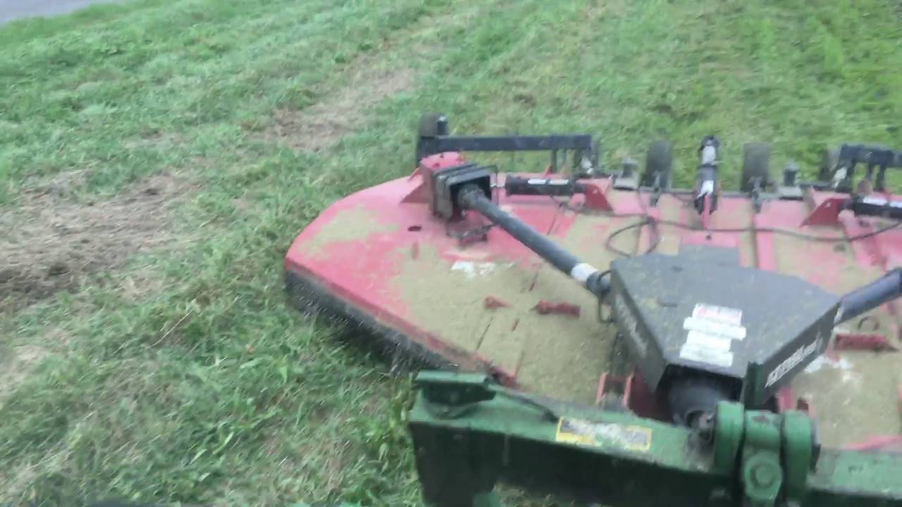 Bush hogging around the corn field - YouTube