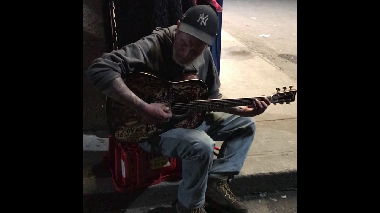 Homeless Man shows off guitar skills in the street. street talent ...