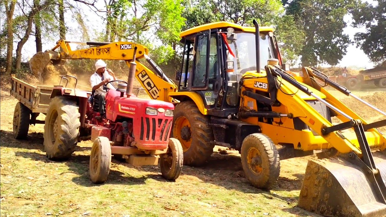 New Jcb 3dx Backhoe Machine Loading Mud In Old Preet 3549 And Mahindra ...
