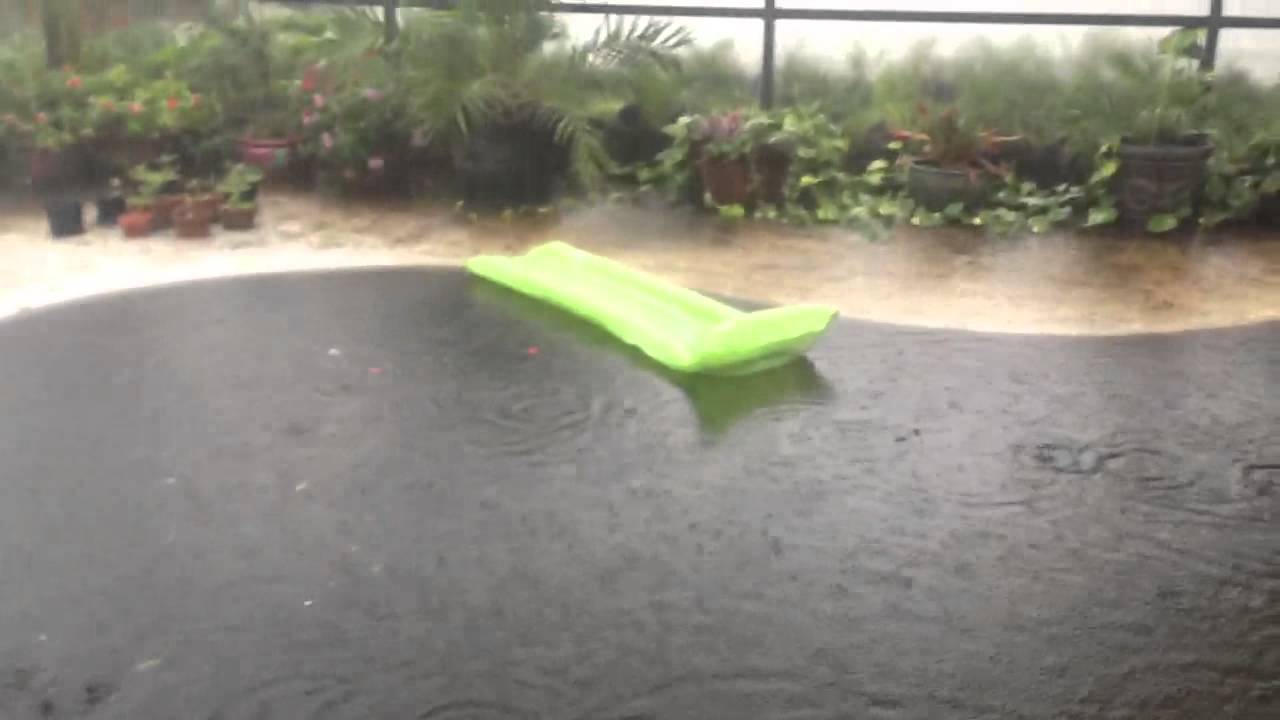 Back yard flooding pool to pond - YouTube