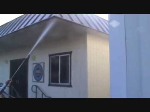 How to power wash a building - YouTube