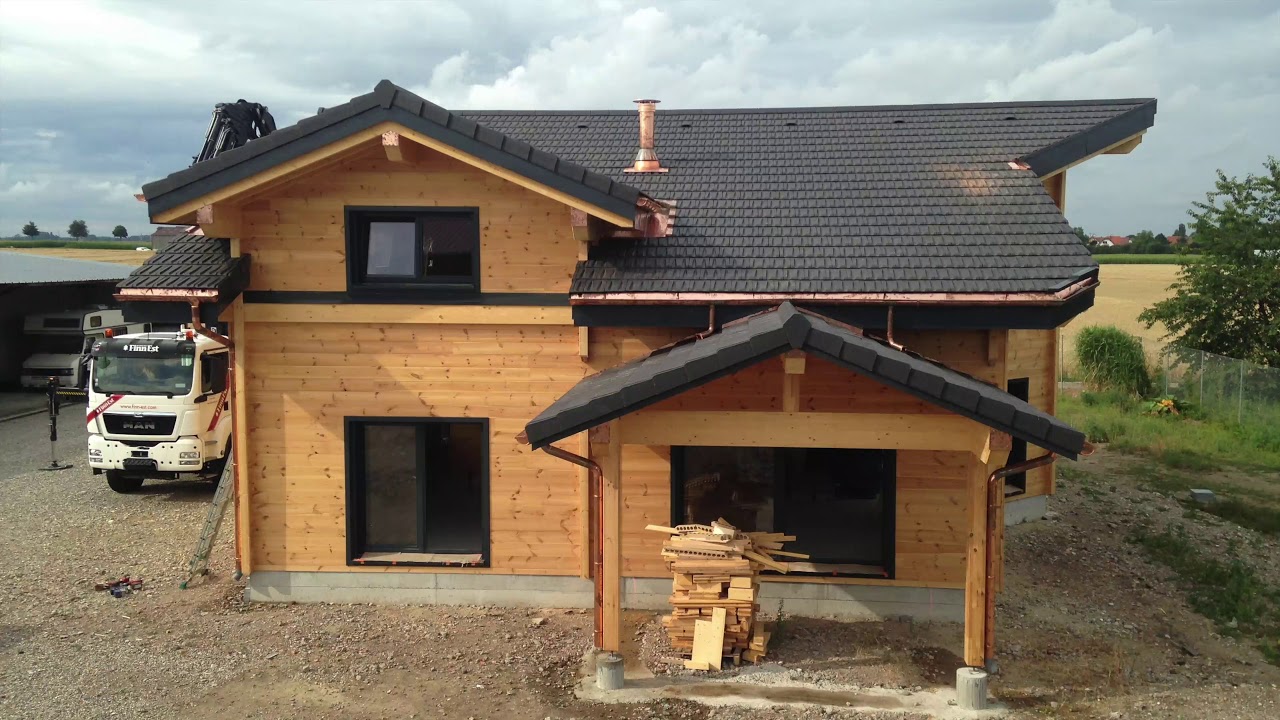 Montage maison madrier - YouTube