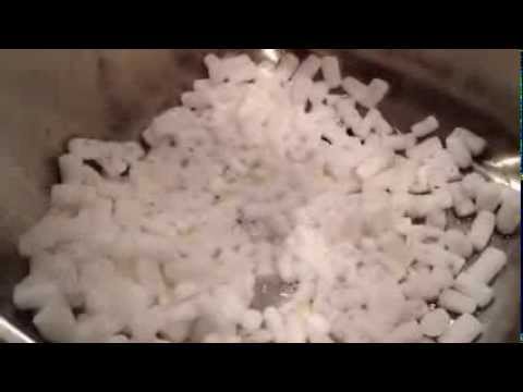 Cornstarch peanuts dissolve under running water. - YouTube