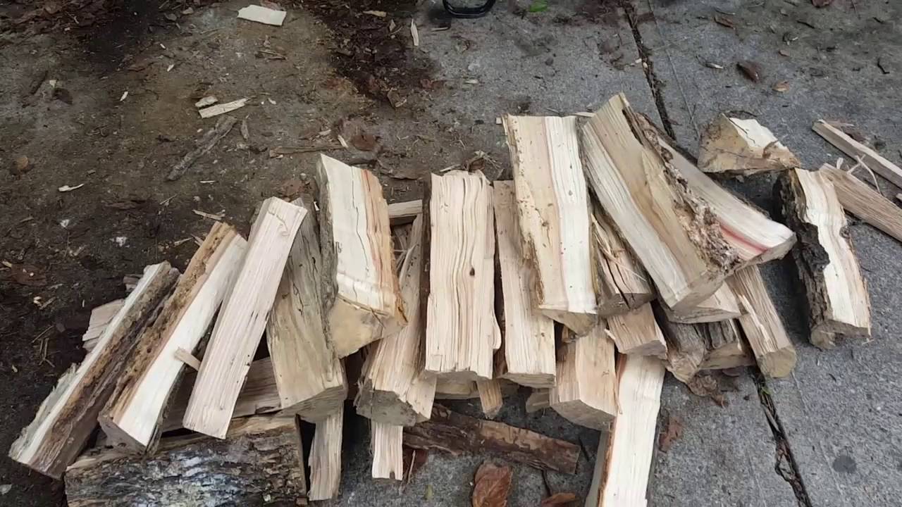 Firewood splitting tips & wheelbarrow load split up and stacked! - YouTube