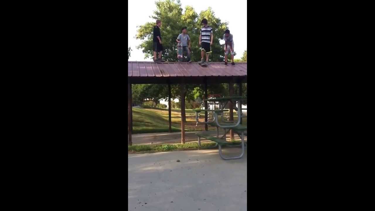 Kid falls off roof trying to jump it with a skateboard!!!!! - YouTube