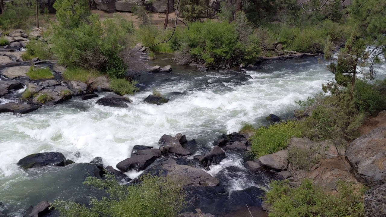 Kayaker shooting Class 4 Deschutes River rapids upstream from Bend ...