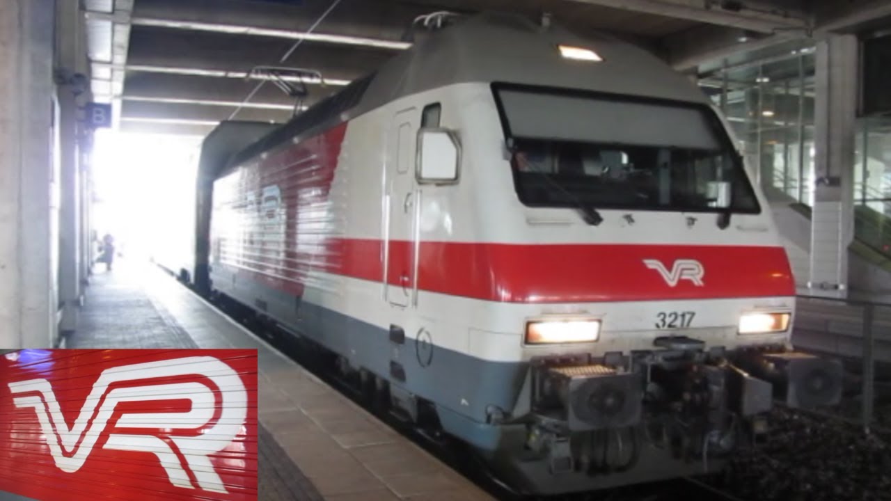 Finland: At Pasila, a VR class Sr2 electric loco departs on a Kuopio to ...