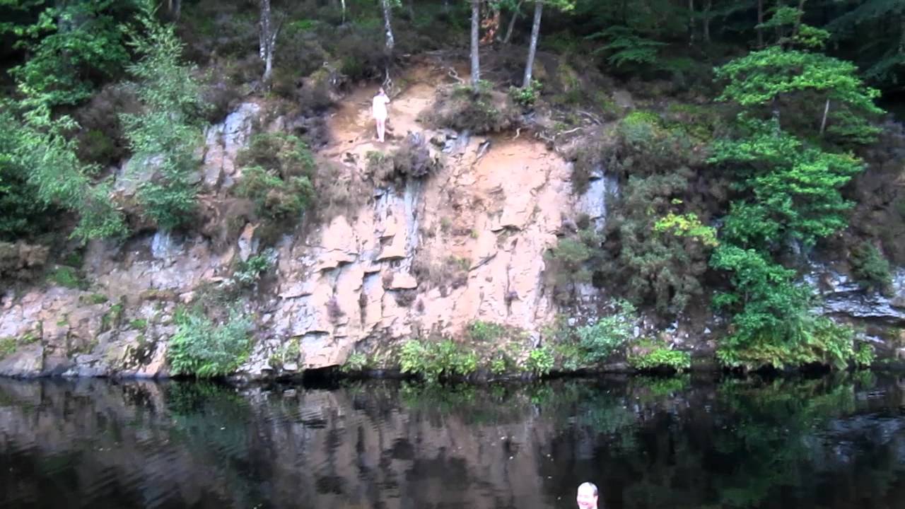 me jumping off the cliff thingy at spitchwick!! :) - YouTube