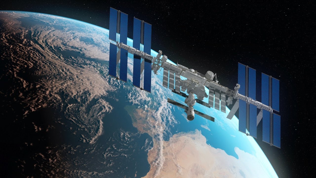 WATCH: Astronauts conduct spacewalk to upgrade ISS power system - YouTube