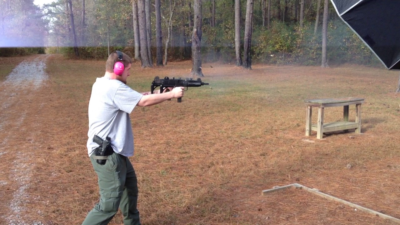 Dual Uzi sub machine guns - YouTube