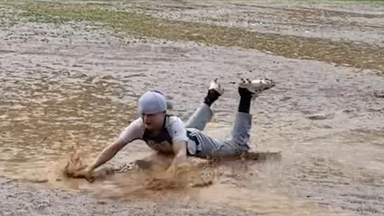 He Slid on a Flooded Baseball Field - YouTube