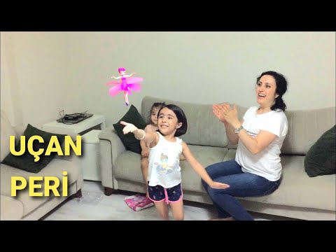DEFNE UÇAN PERİ İLE OYNUYOR. PERİMİZ HARİKA UÇUYOR. FLYING FAIRY.