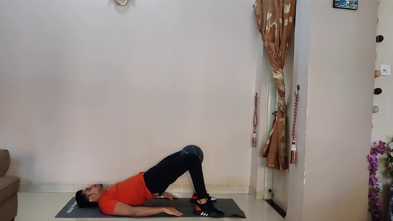 Isometric squeeze Glute bridge to toe raise - YouTube