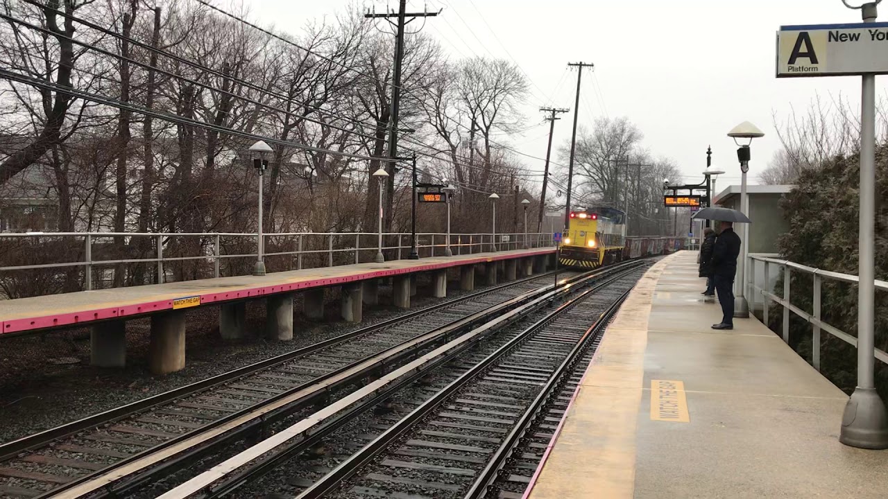 LIRR RARE EMD MP15AC #153 & #171 pulling equipment through Garden City ...
