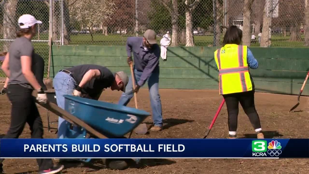 Sacramento parents come together to build new softball field - YouTube