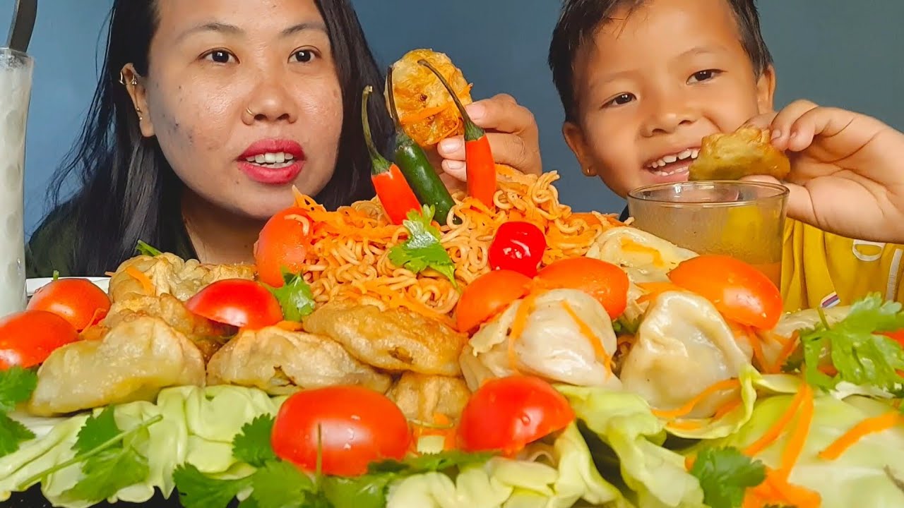 Eating lots of fried and steamed buff momos,3pack spicy noodles,spicy ...