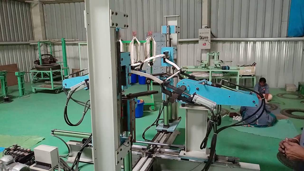 Coil stretching machine - YouTube