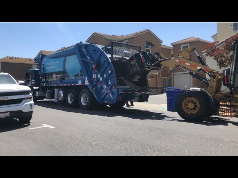 Republic Services rear loader 2013 eating bulk waste - YouTube
