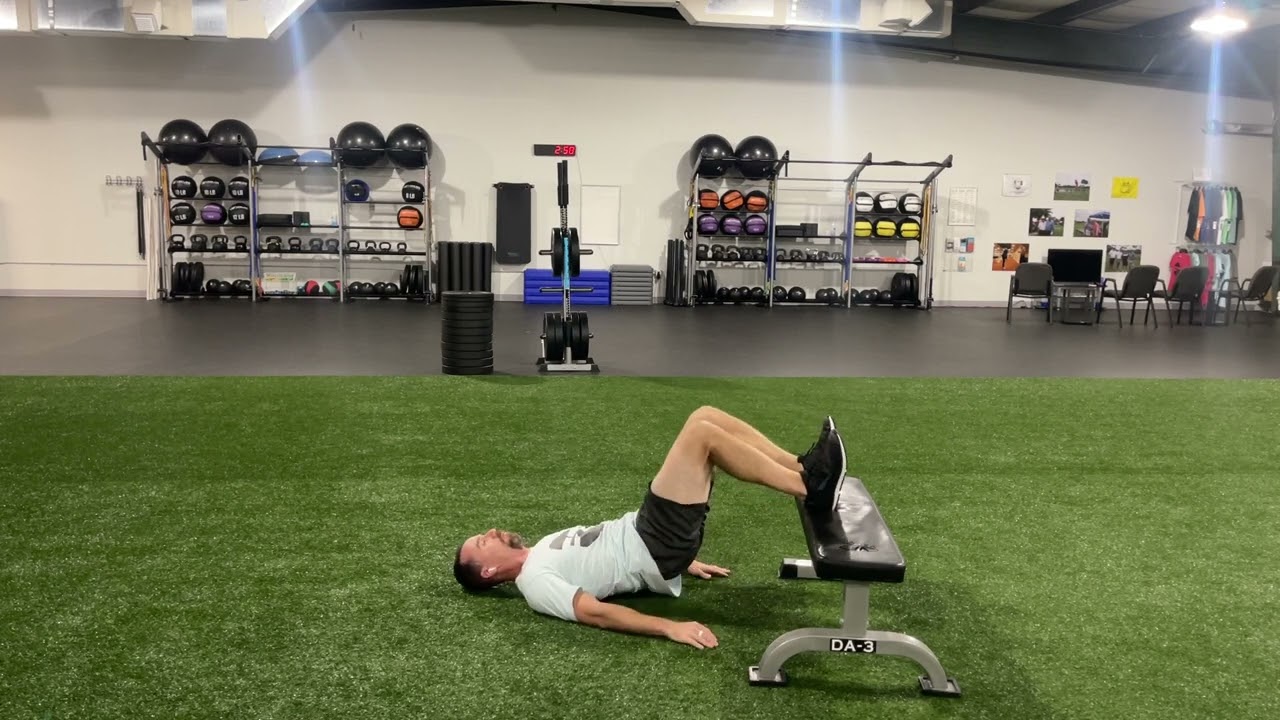 Glute Bridge w Heels into Bench - YouTube