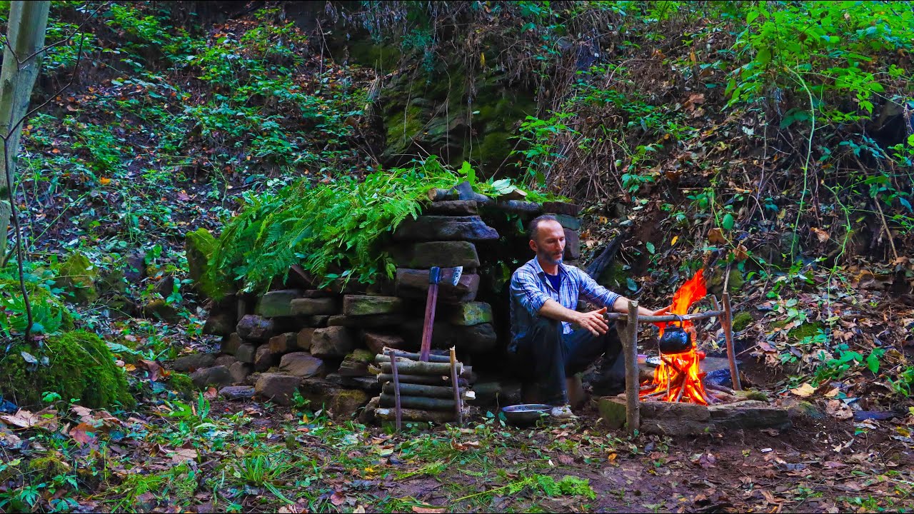 Building a Primitive Rock Survival Shelter | Solo Wild Camping | Alone ...