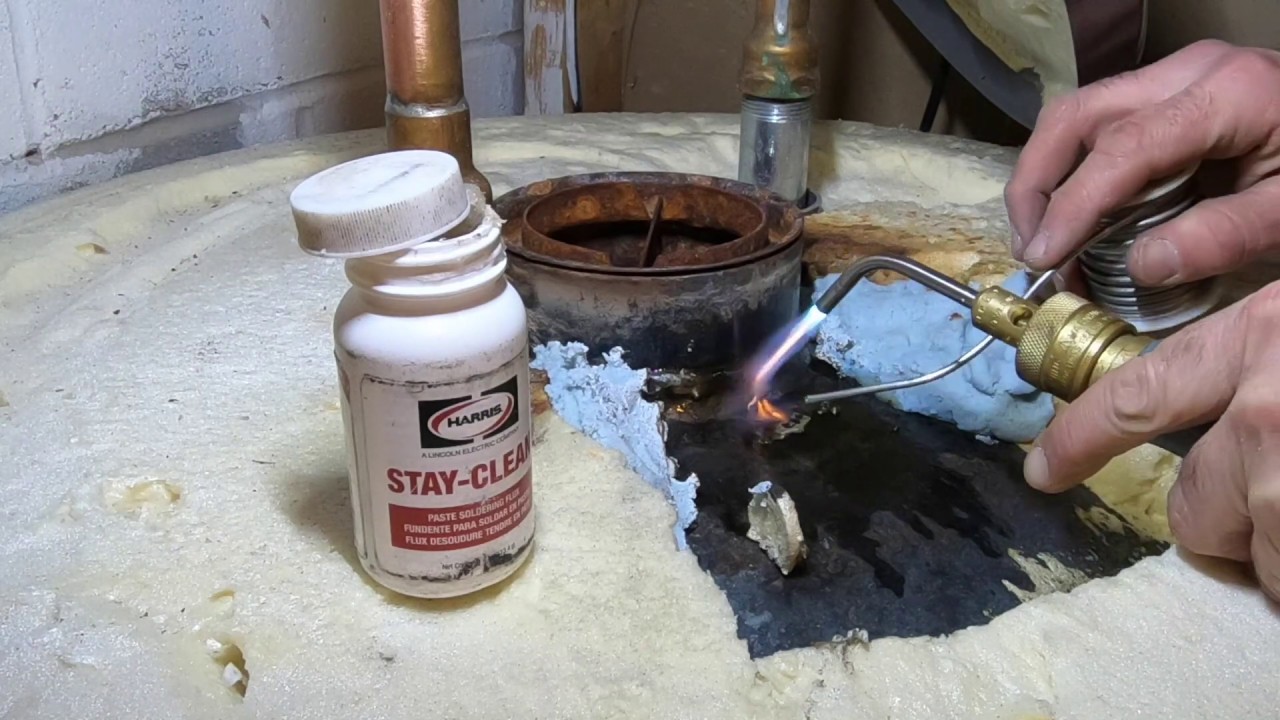 Soldering Leaking Water Heater Tank - YouTube