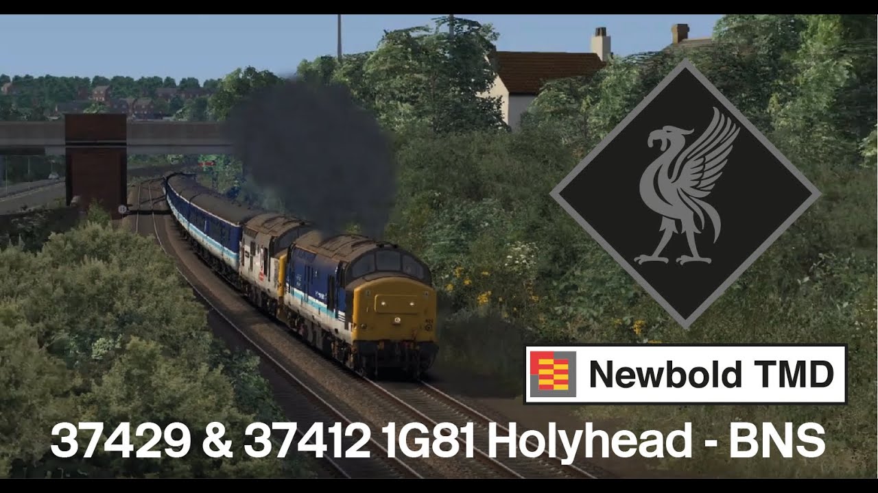 Class 37s 37429 & 37412 leaving Holyhead 2000 - YouTube