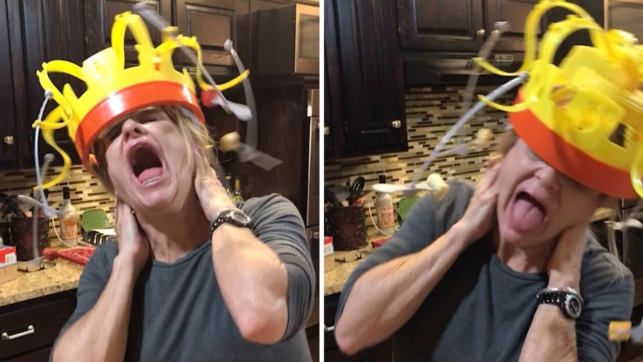 Woman Tries To Eat Treats Dangling From Crown - YouTube