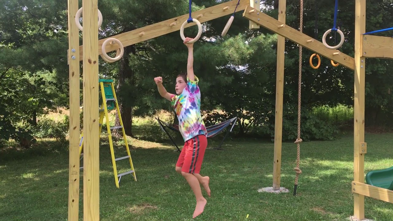 Kid does ninja warrior course in backyard! - YouTube