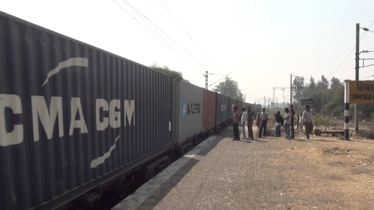 COLOURFUL FREIGHT TRAIN WITH 3900HP WAG-5 LOCO CURVING IN & OUT OF ...