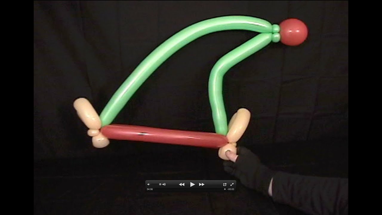 Learn how to make a balloon animal elf hat using balloon twisting - YouTube