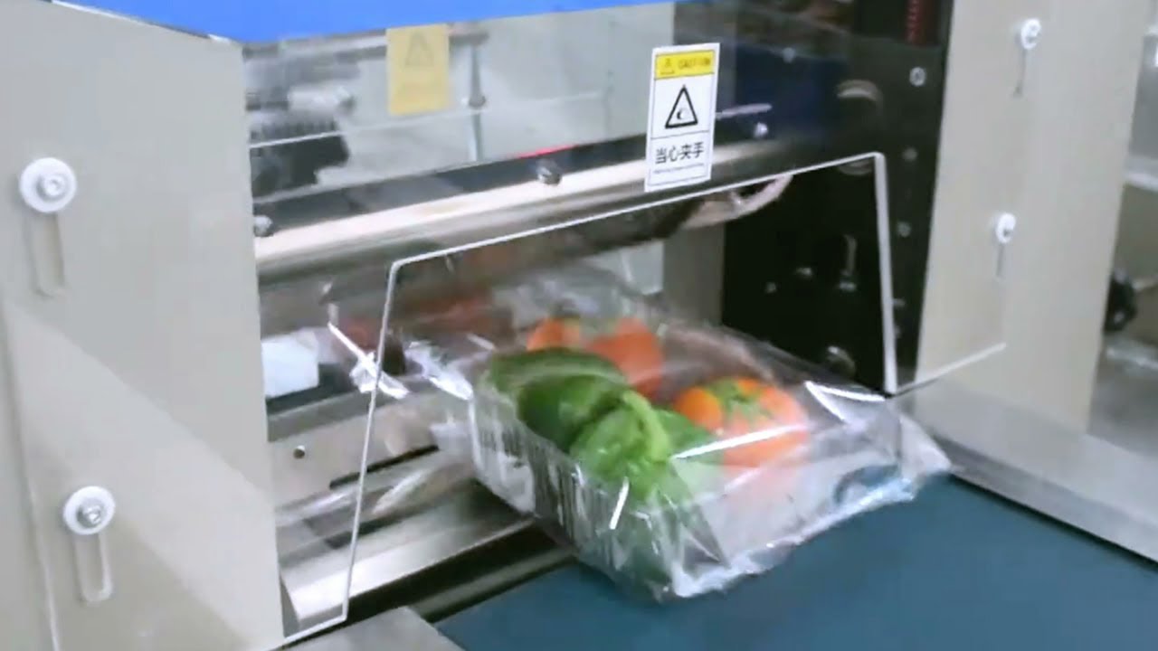 Tomato with tray flow wap packing machine vegetables film wrapper - YouTube