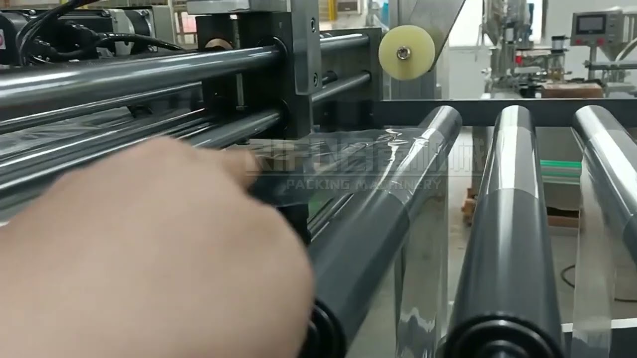 How to install roll film on the cellophane wrappin machine - YouTube