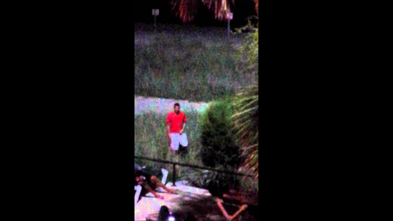 Dude was pooping in the bushes on the beach - YouTube