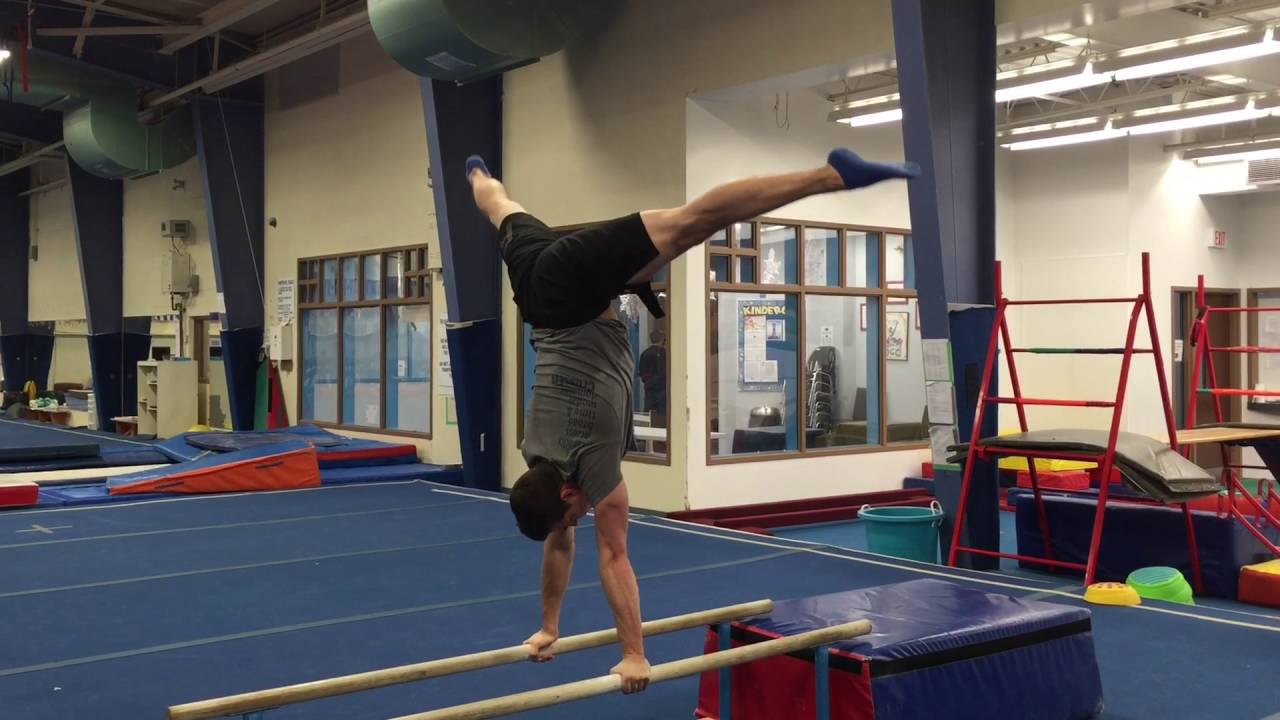 P bar Stalder Press to Handstand - YouTube