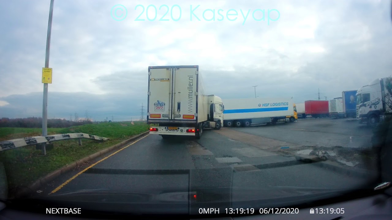 HGV Driver reverses without checking who is behind... - YouTube