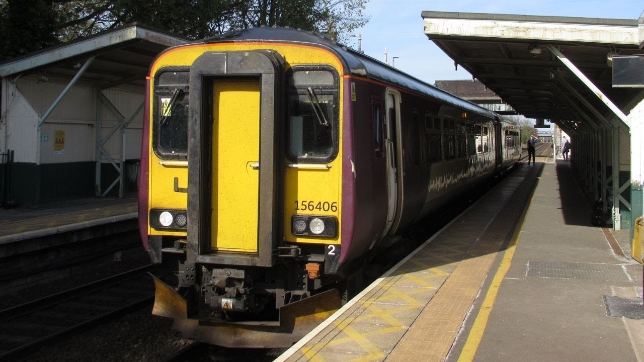 UK: An East Midlands Railway (EMR) Class 156 departs from Beeston on a ...