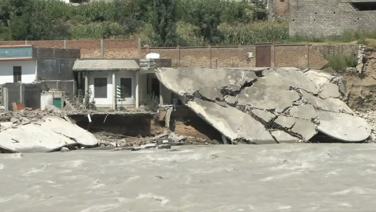 Pakistan: Houses damaged by flooding along Swat River | AFP - YouTube