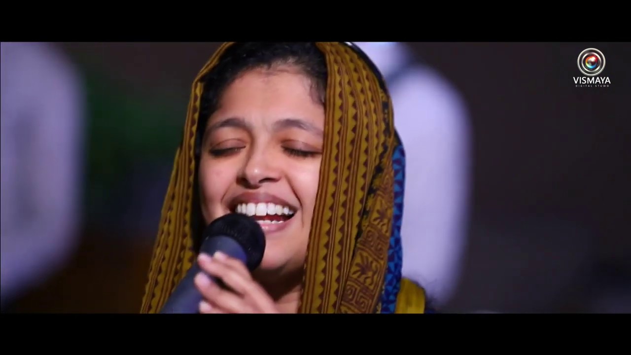 A sweet and adorable song by Asha Job for the wedding of Justin Joseph ...