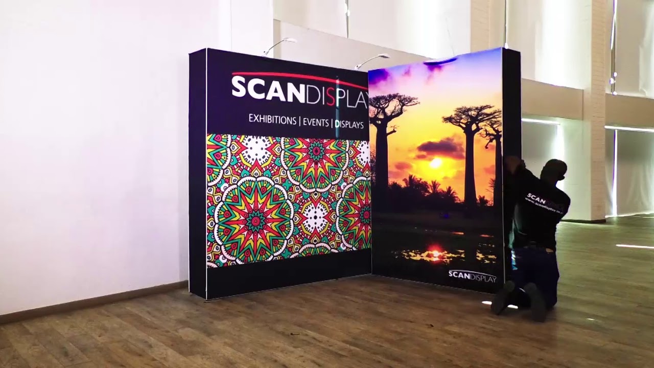 Easy set-up of a portable display system with fabric graphics - YouTube